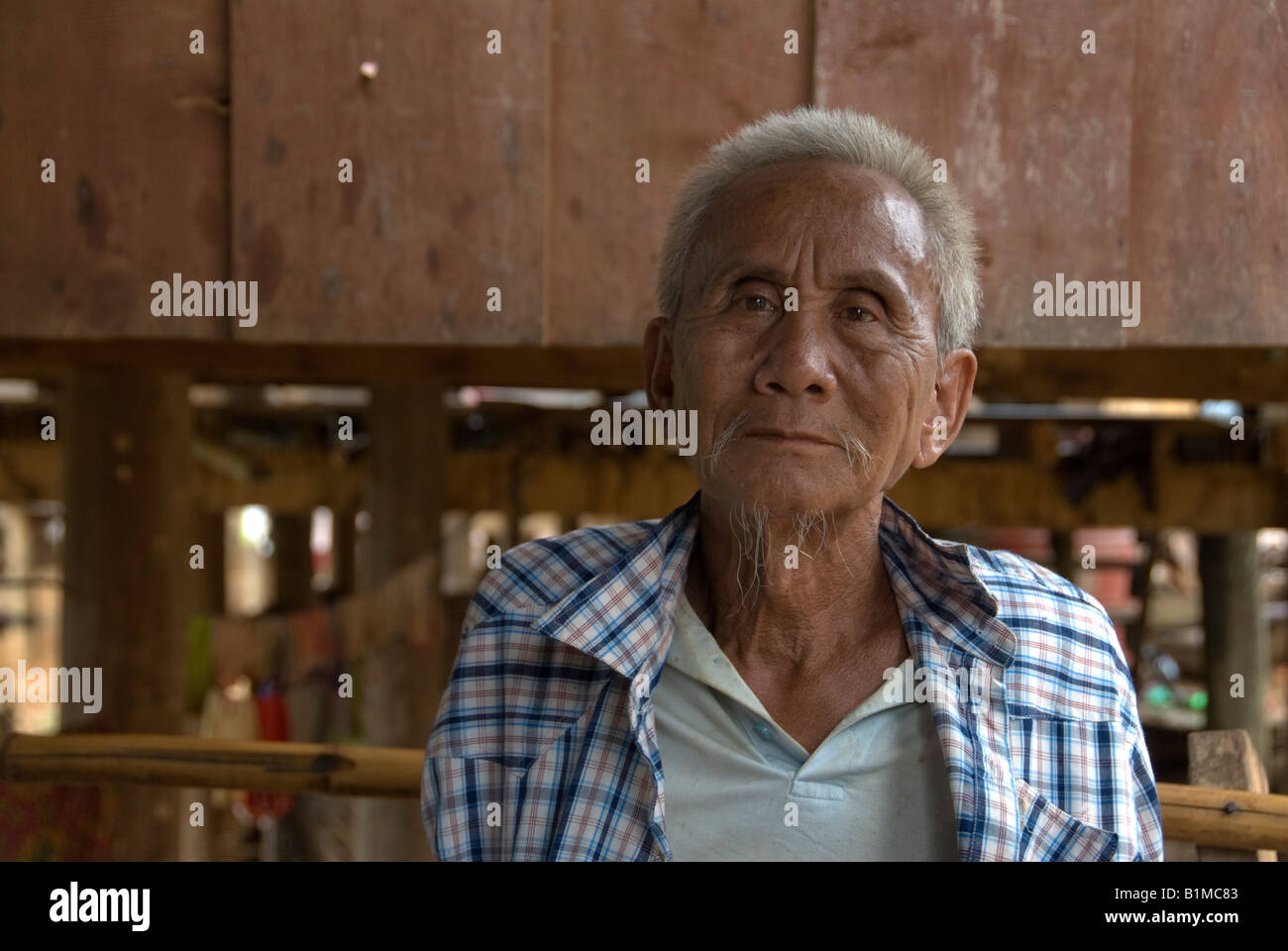 Old Lahu hill tribe man in a northern Thai village Stock Photo - Alamy