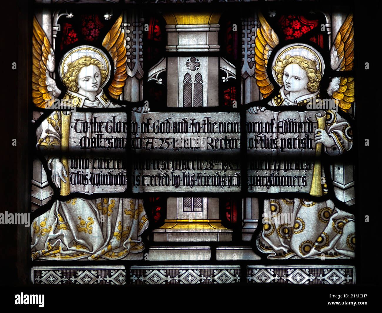 Stained Glass Window of Two Angels Holding a Memorial to a Past Rector ...