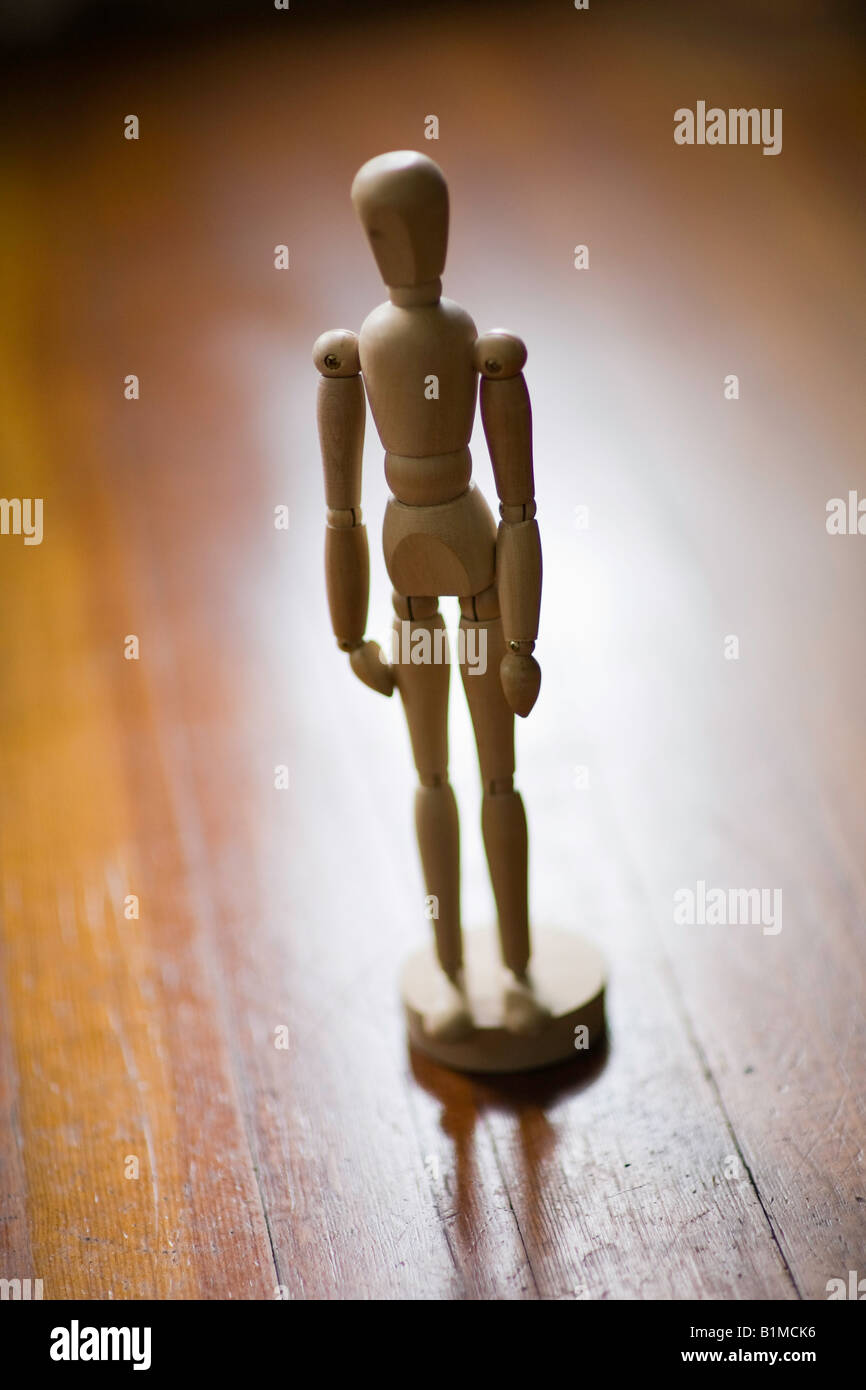 A Drawing Figurine on Wood Floor Stock Photo - Alamy