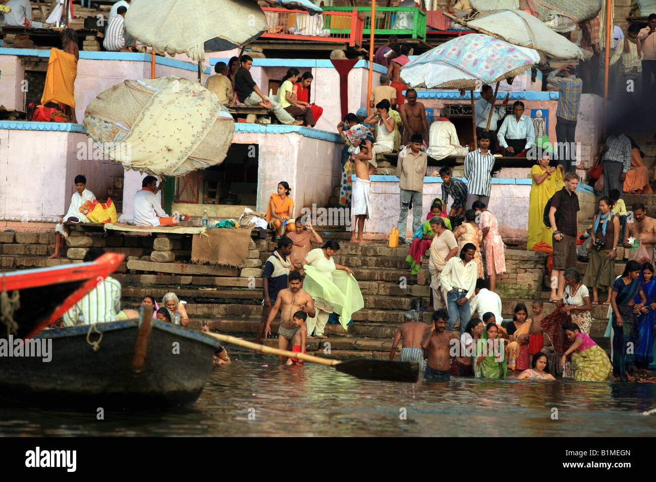 Early morning ablutions on the banks of the Ganges at Varanasi Uttar ...