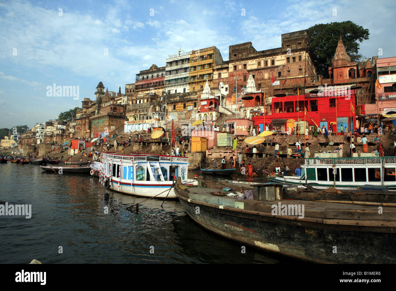 Early morning ablutions on the banks of the Ganges at Varanasi Uttar ...
