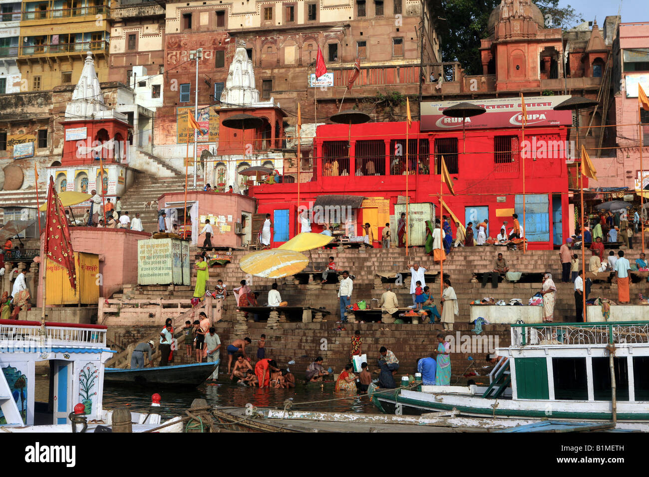 Early morning ablutions on the banks of the Ganges at Varanasi Uttar ...