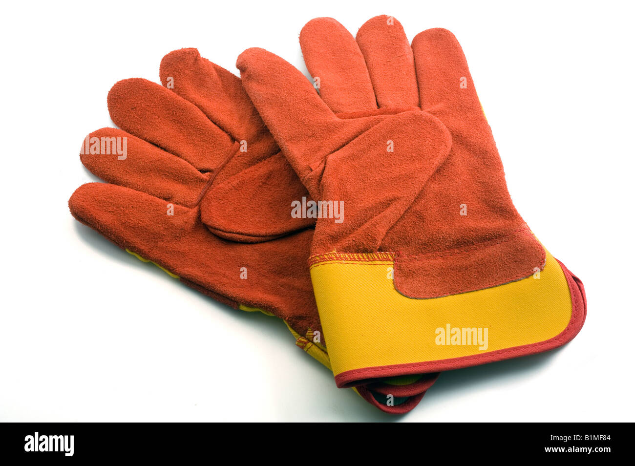 red garden gloves isolated on white Stock Photo - Alamy