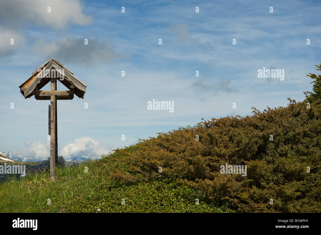 wooden signpost with canopy on hillside Stock Photo - Alamy