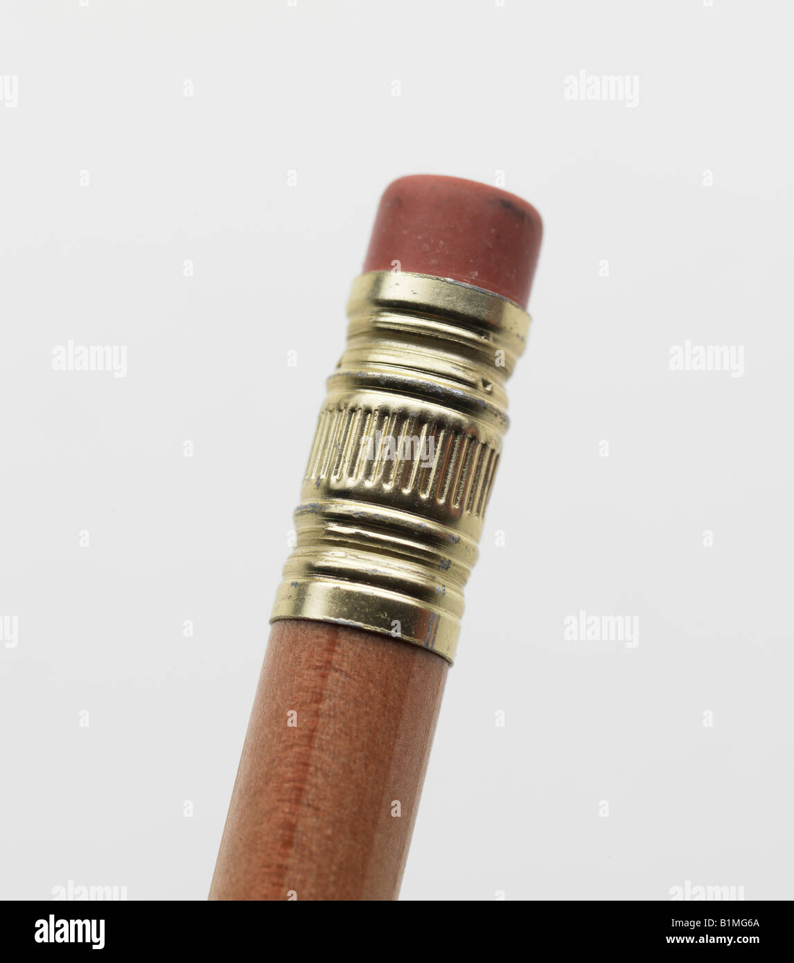 rubber eraser pencil gold metal red wood close-up Stock Photo - Alamy
