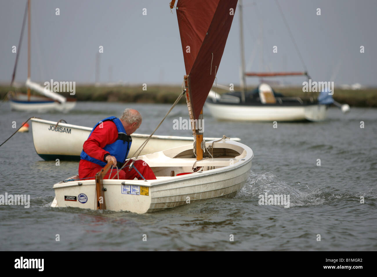 EAST COAST BLAKENEY NORFOLK UK SAILING DINGHY Stock Photo - Alamy