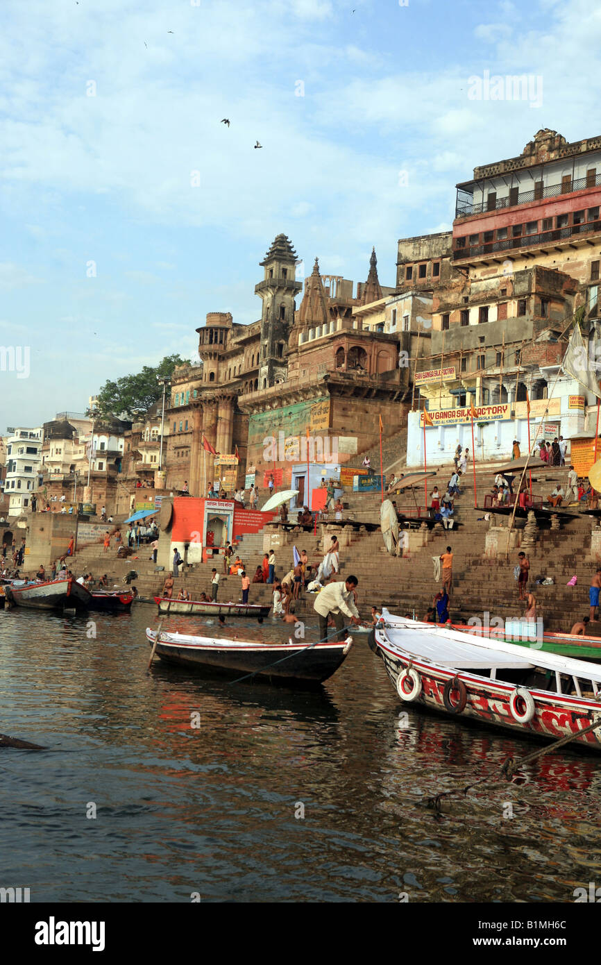 Early morning ablutions on the banks of the Ganges at Varanasi Uttar ...