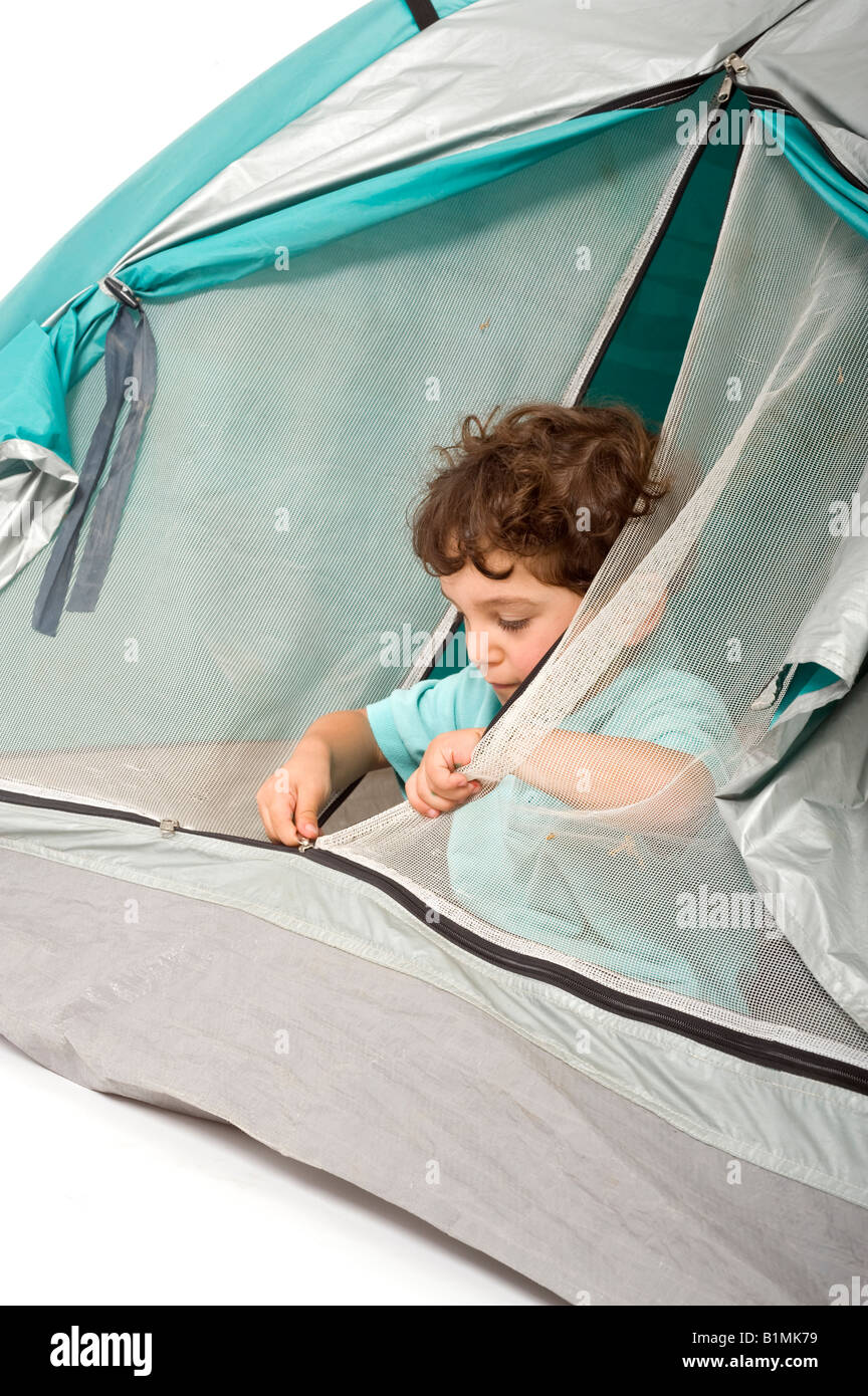 young boy in a tent isolated on white Stock Photo - Alamy