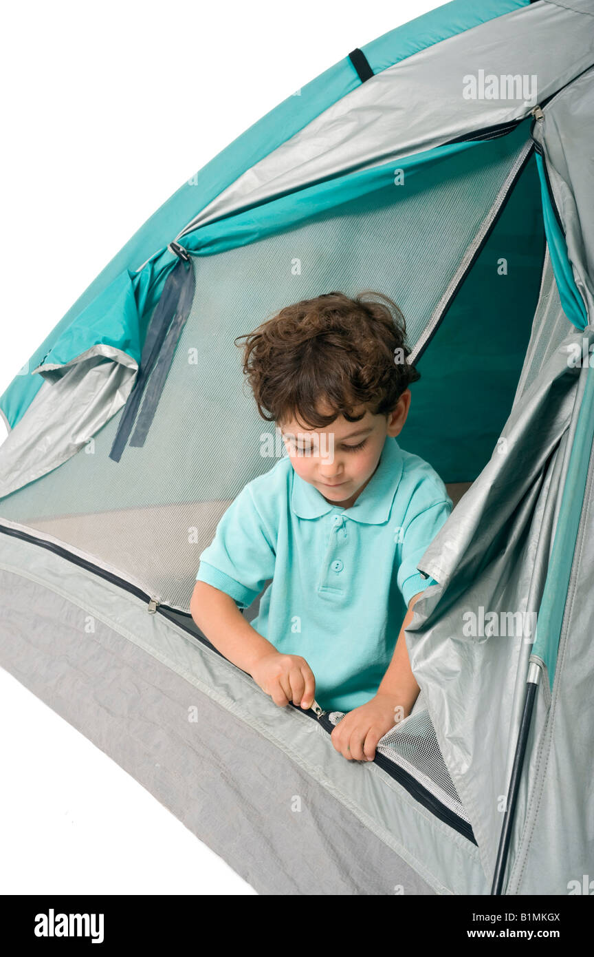 young boy in a tent isolated on white Stock Photo - Alamy