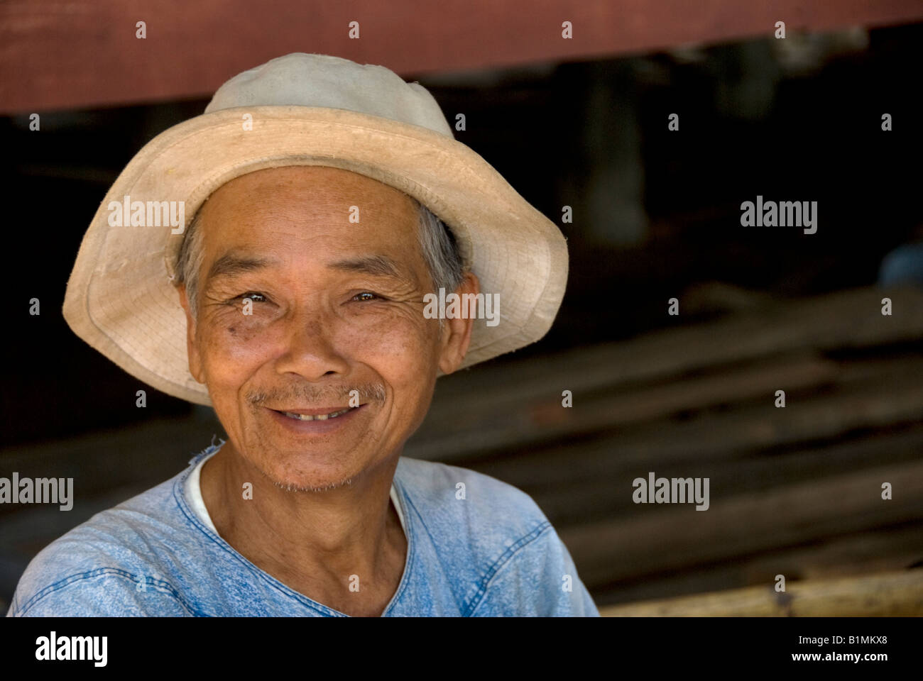Portrait of a happy older Asian man Stock Photo - Alamy