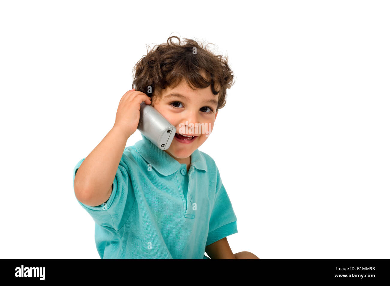 young boy talking on the phone isolated on white Stock Photo - Alamy