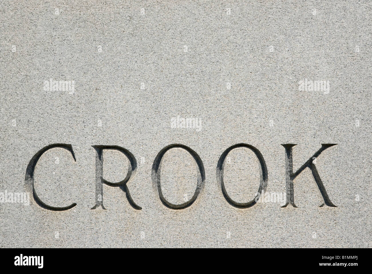 Gravestone with word Crook on it Stock Photo - Alamy