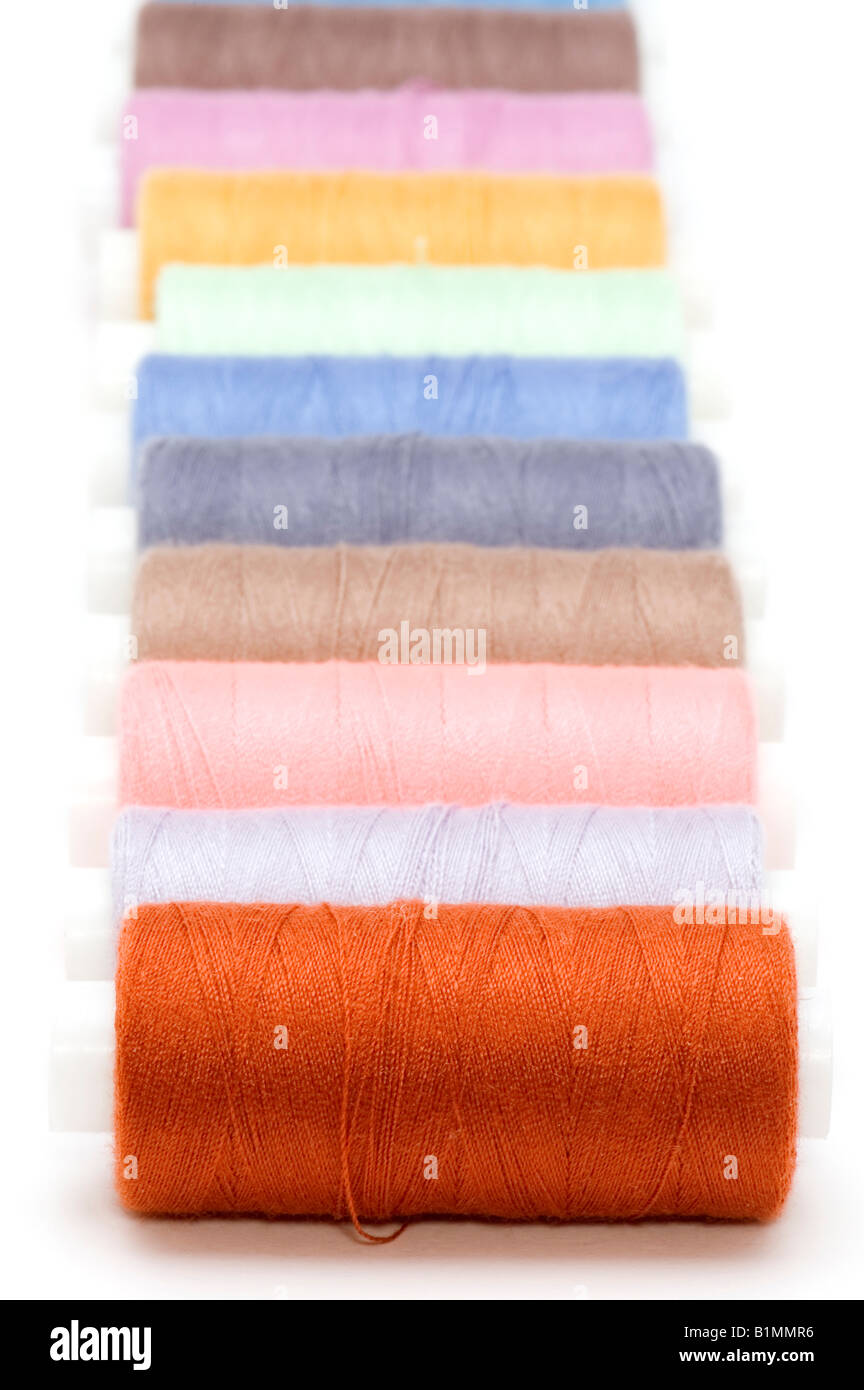 object on white sewing cotton rolls Stock Photo - Alamy