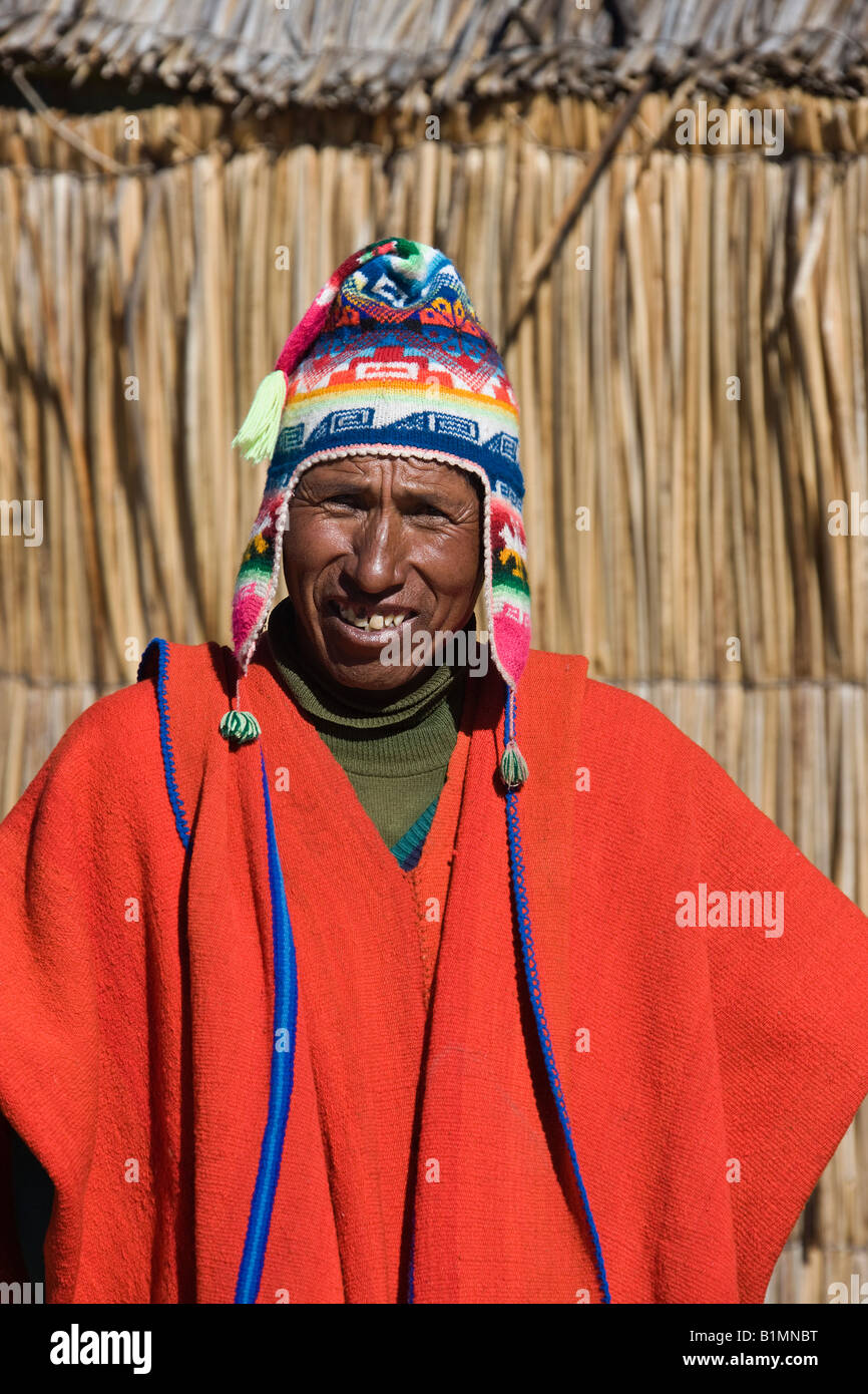 Local man at a traditional Urus Iruitos reed village on Lake Titicaca ...
