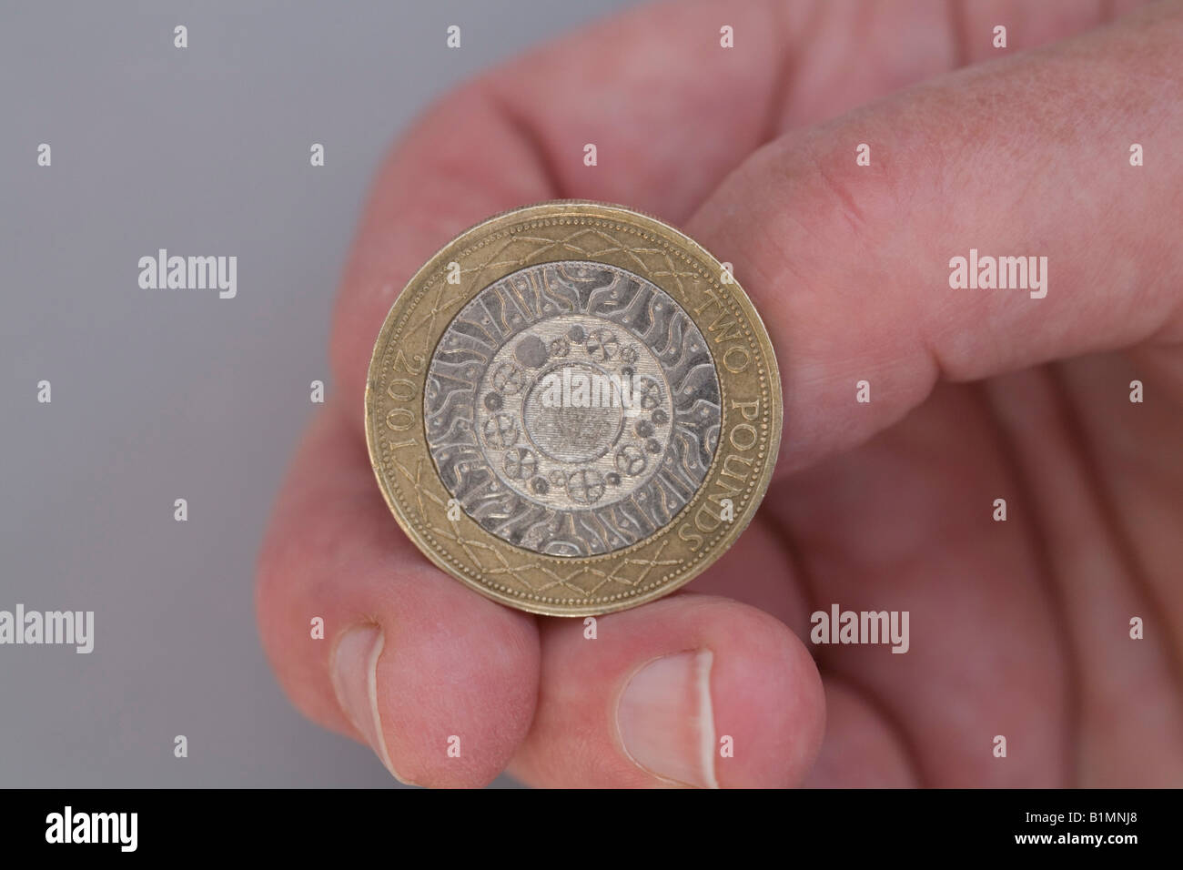 Bent coin hi-res stock photography and images - Alamy
