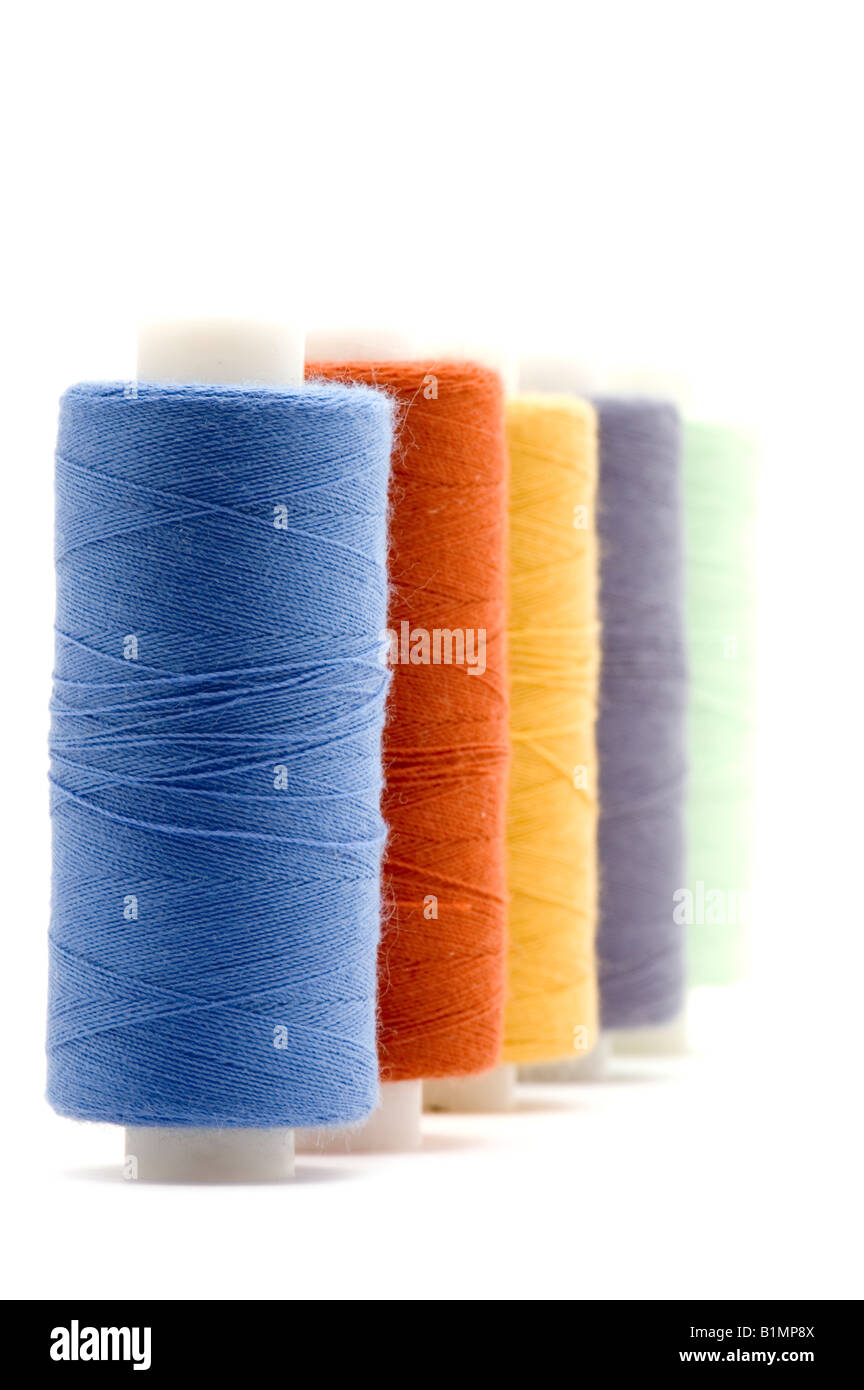 object on white sewing cotton rolls Stock Photo - Alamy