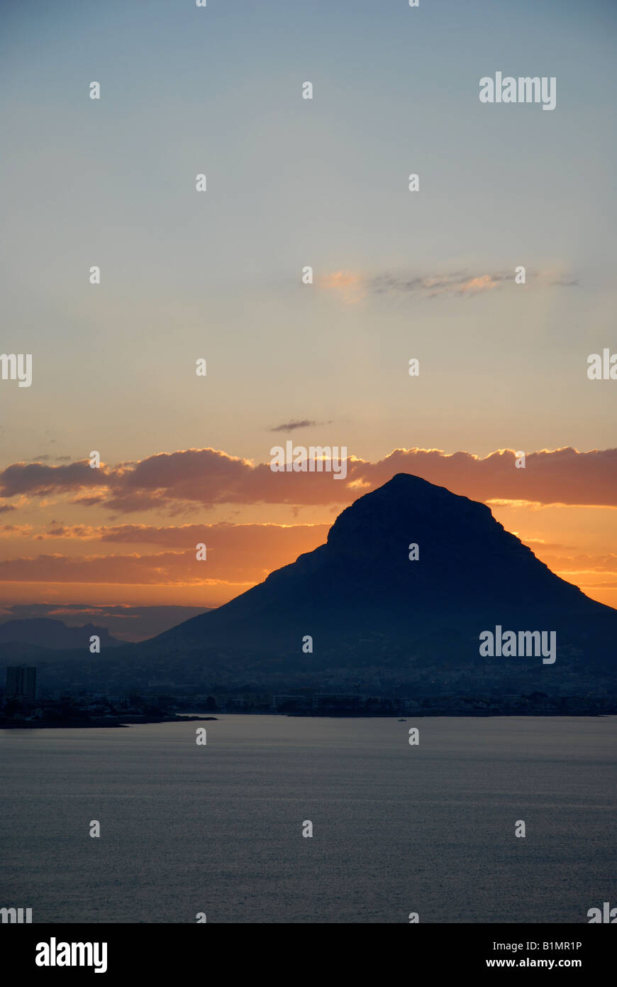 view to Montgo and Arenal area from Cabo San Martin at sunset, Javea ...
