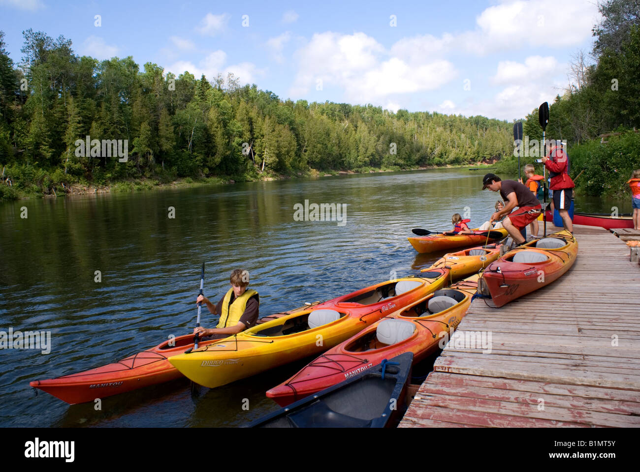 paddlers kayakers Bonaventure River Quebec dock Stock Photo - Alamy