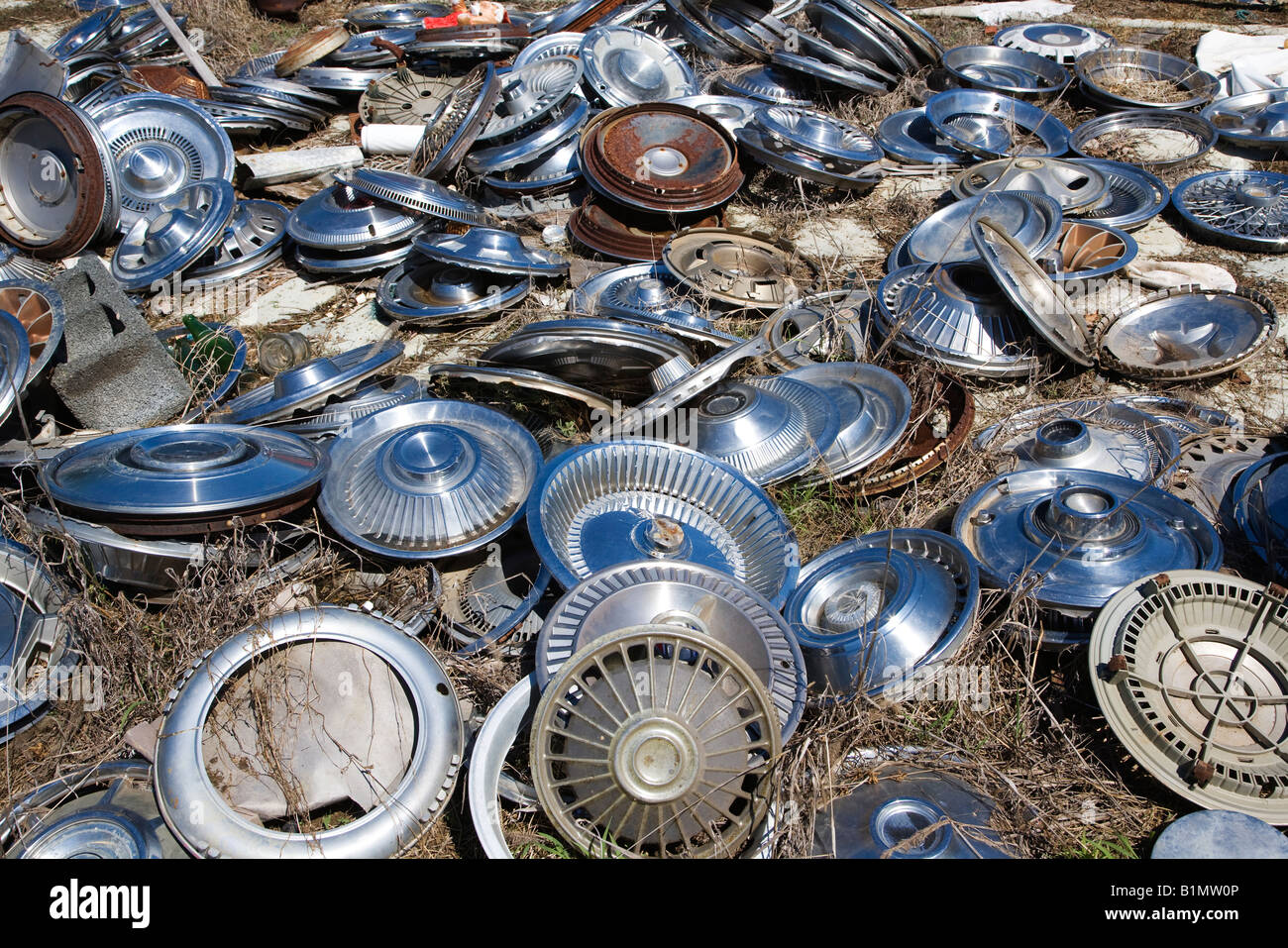Old metal hubcaps ground hi-res stock photography and images - Alamy