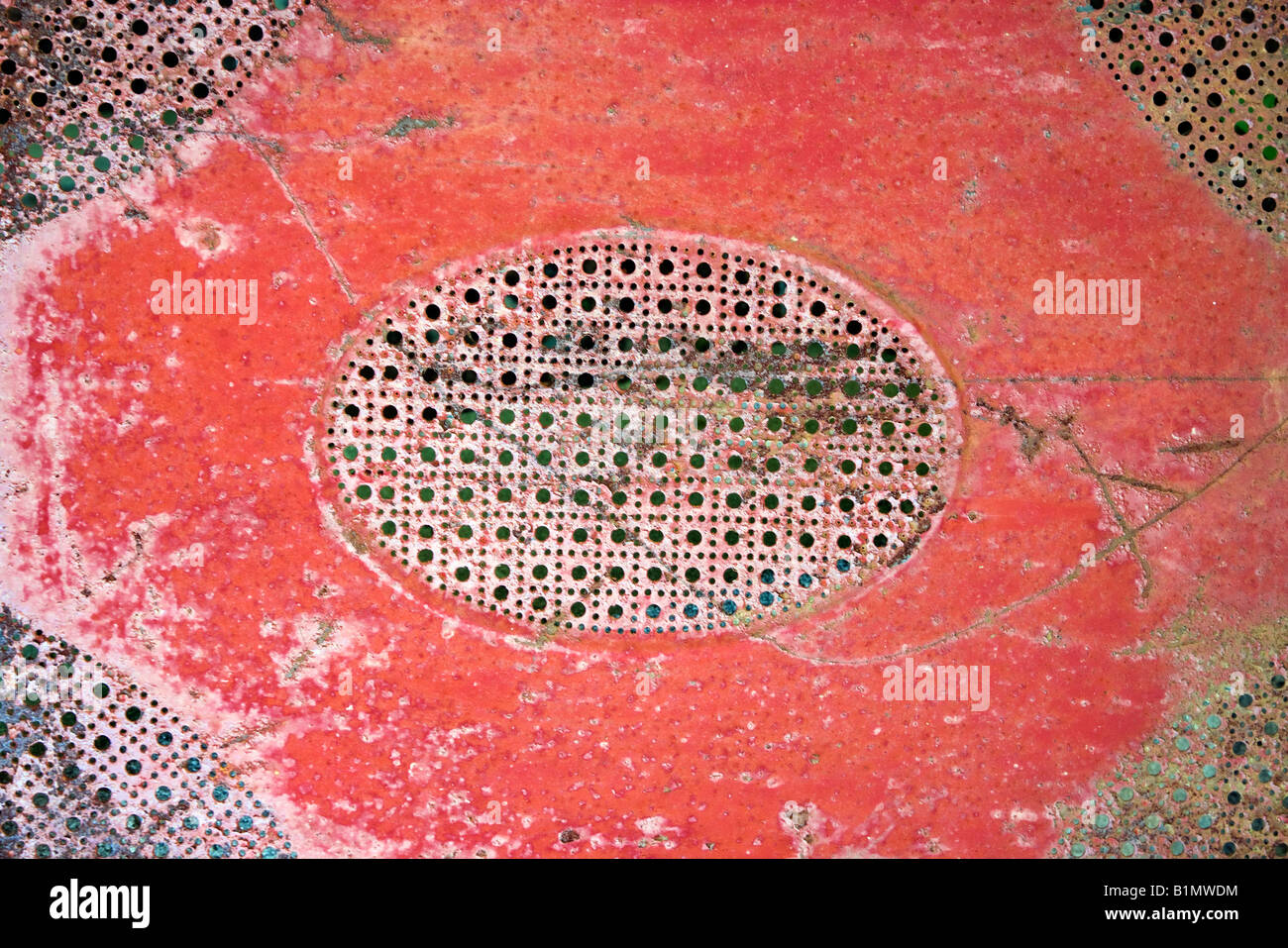 Old red patterned piece of metal Stock Photo - Alamy