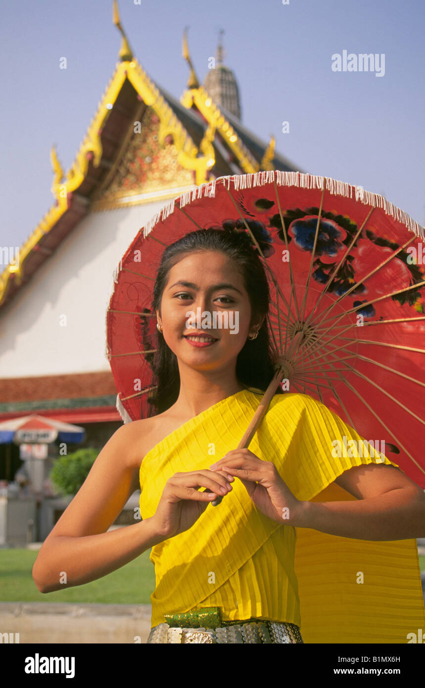 A beautiful young Thai girl wearing traditional Siamese clothing at the ...