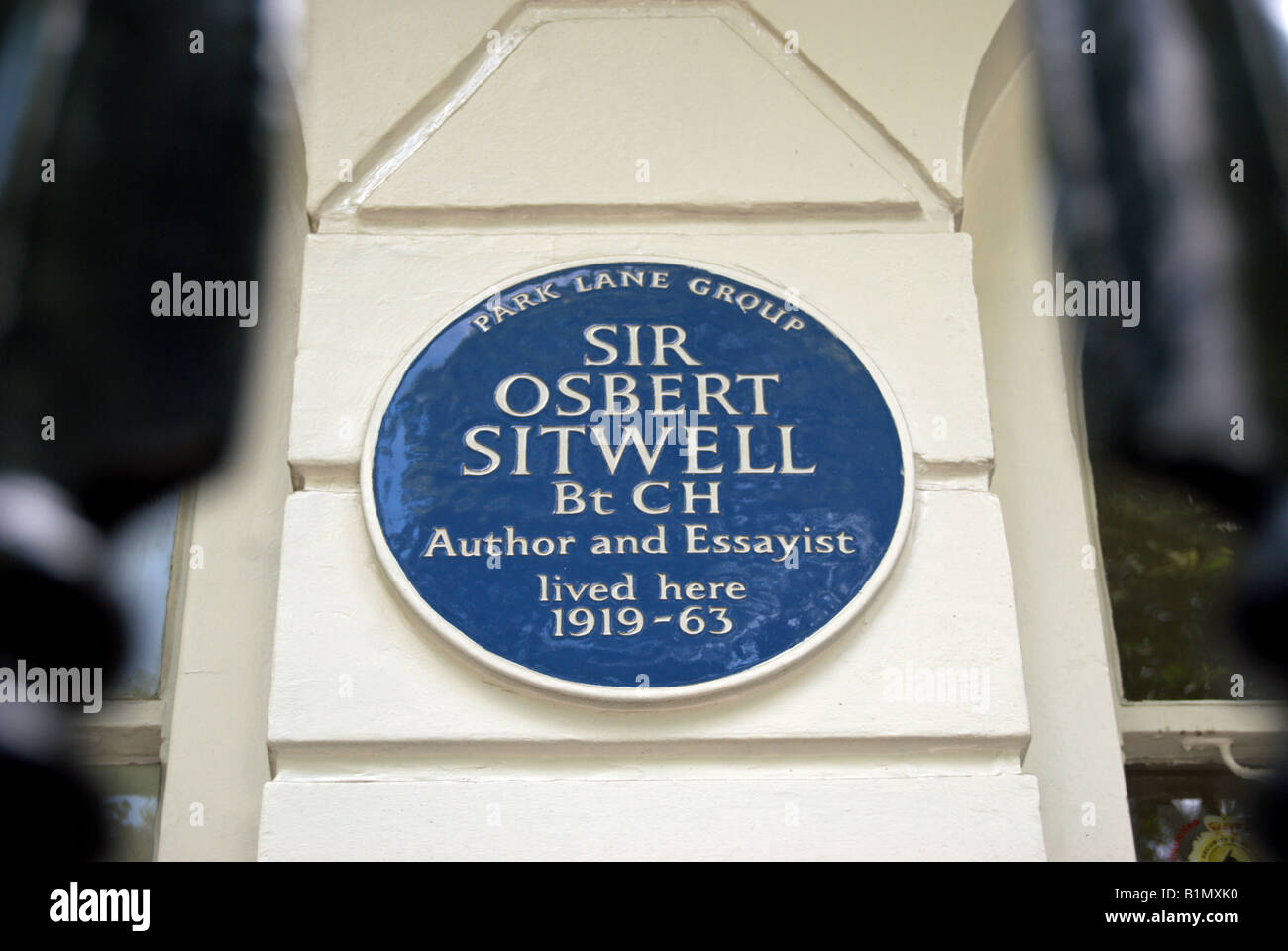 blue plaque marking a former home of english author and essayist sir ...