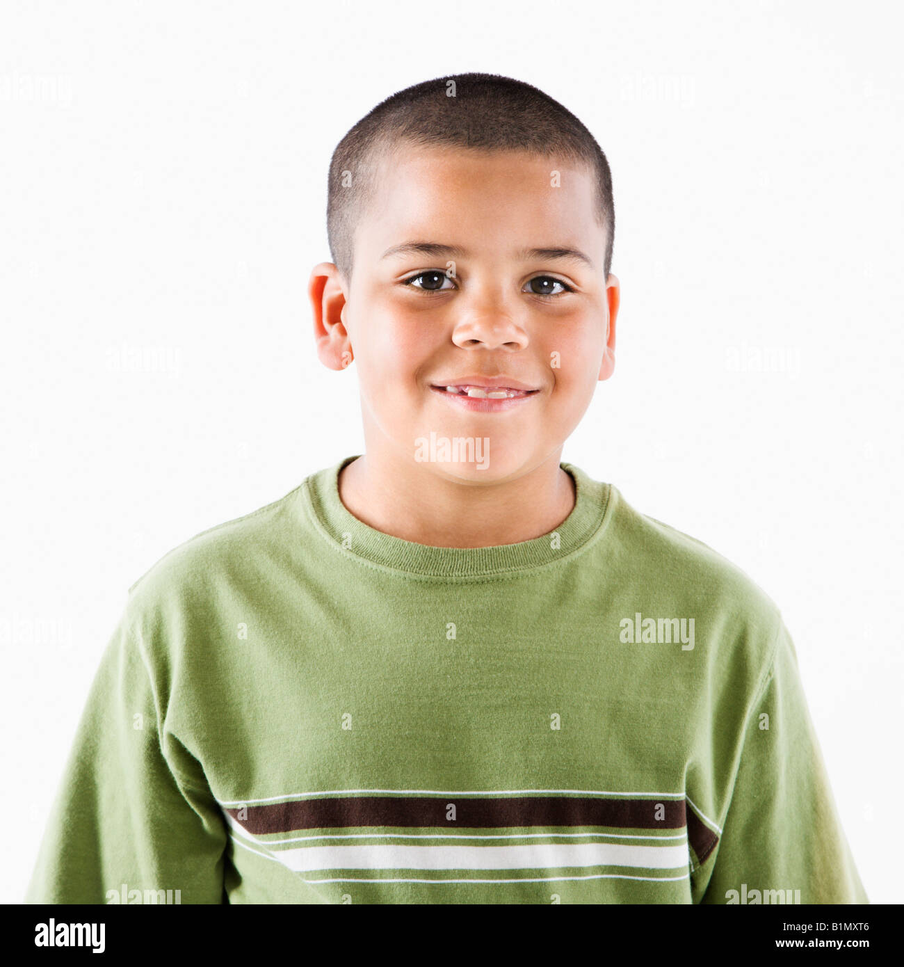 Young latino adolescent boy standing smiling at viewer Stock Photo - Alamy