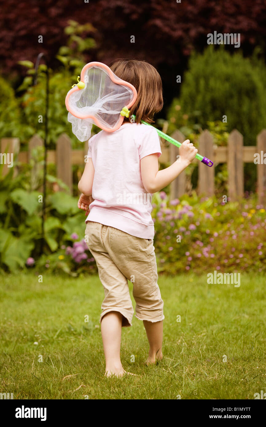 little girl holding a butterfly net Stock Photo - Alamy