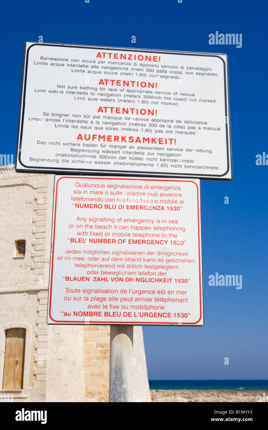 Beach emergency and swimming sign, Puglia, Italy Stock Photo - Alamy
