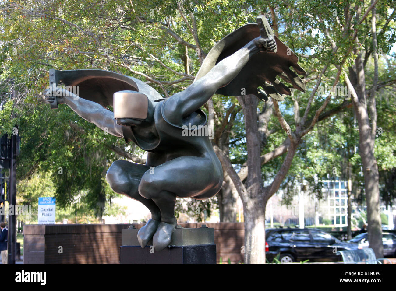 Statue of a flying human figure in the streets of Orlando Florida Stock ...