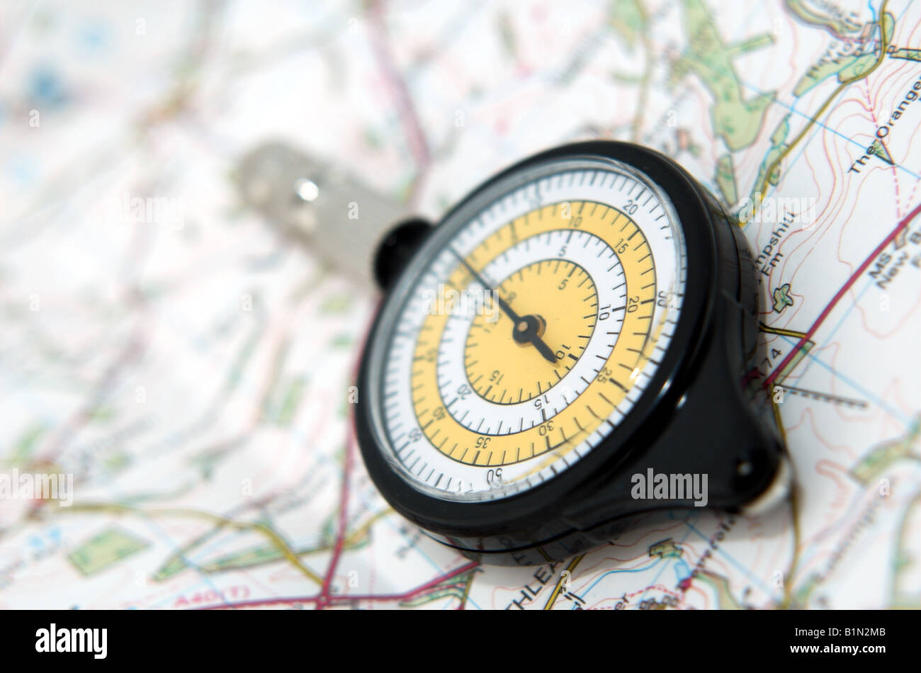 "map measurer' resting on map Stock Photo - Alamy