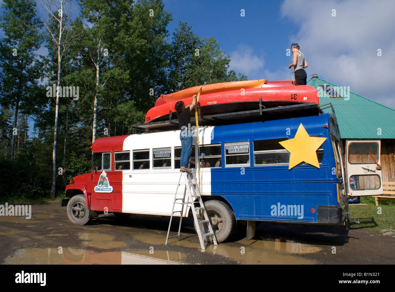 loading canoes on Cime Adventure bus Stock Photo - Alamy
