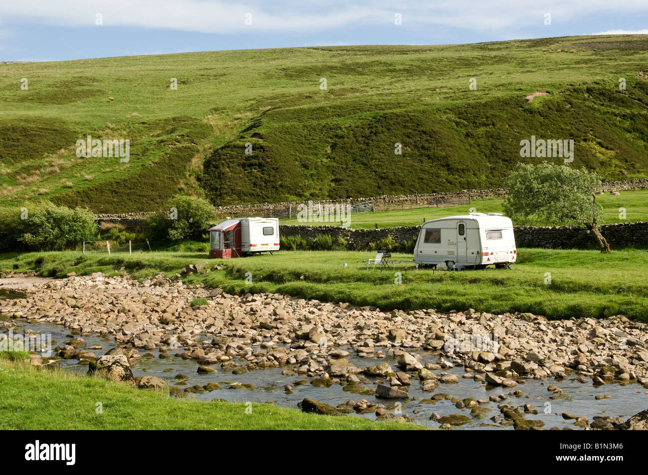 Caravans alongside River Swale Keld North Yorkshire England Stock Photo ...