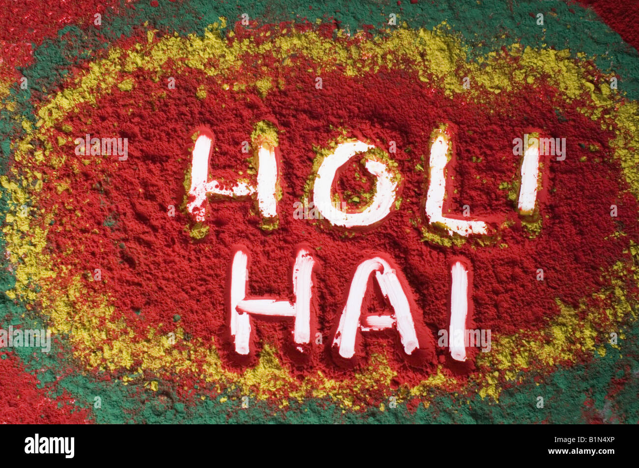 High angle view of text HOLI HAI written on a rangoli Stock Photo - Alamy