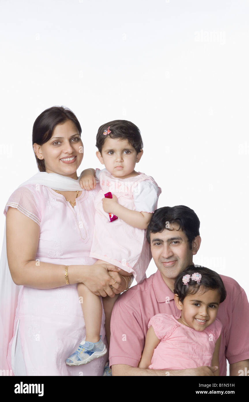 Portrait of a family smiling together Stock Photo - Alamy