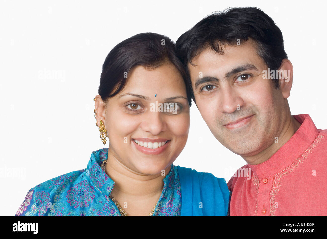 Portrait of a mid adult couple smiling Stock Photo - Alamy