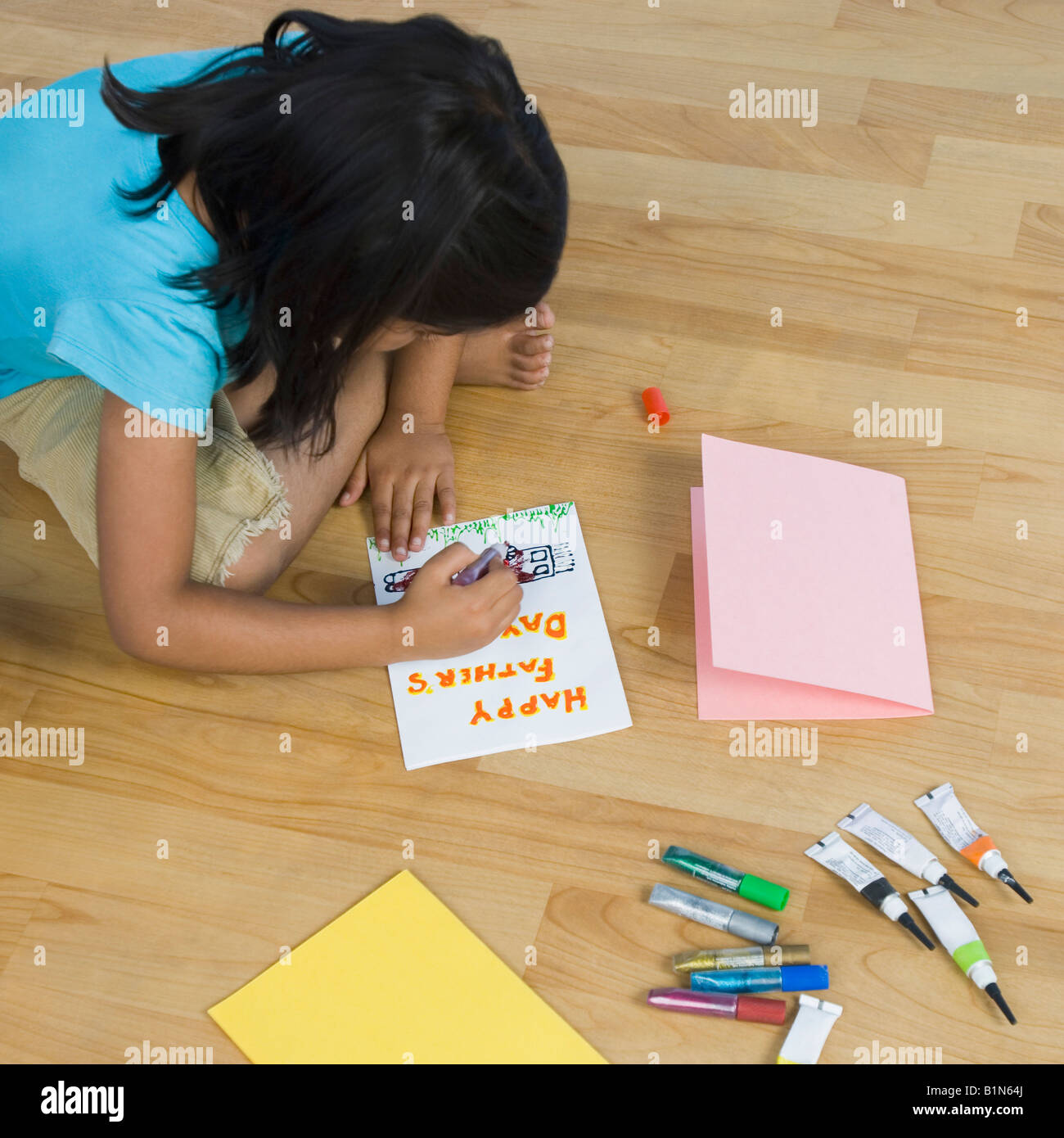 Child making card hi-res stock photography and images - Alamy