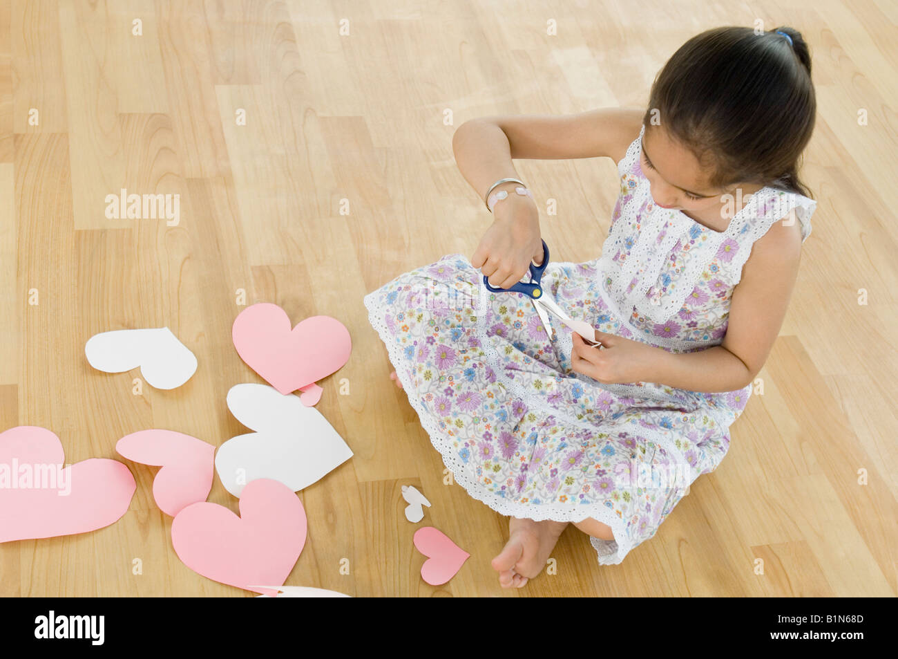 High angle view of a girl making greeting cards Stock Photo - Alamy