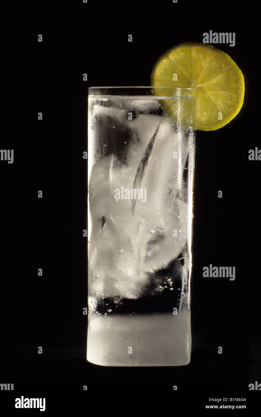 Cool Drink. Lime, ice, soda water, condensation on glass Stock Photo ...