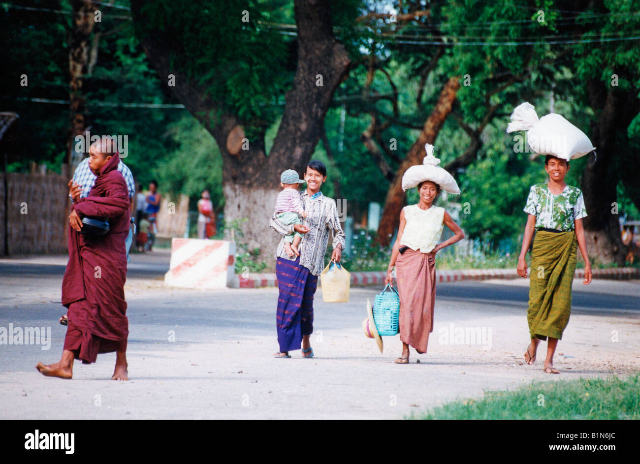 Myanmar Burma People Walking Down The Street Wetkyi-in Stock Photo - Alamy