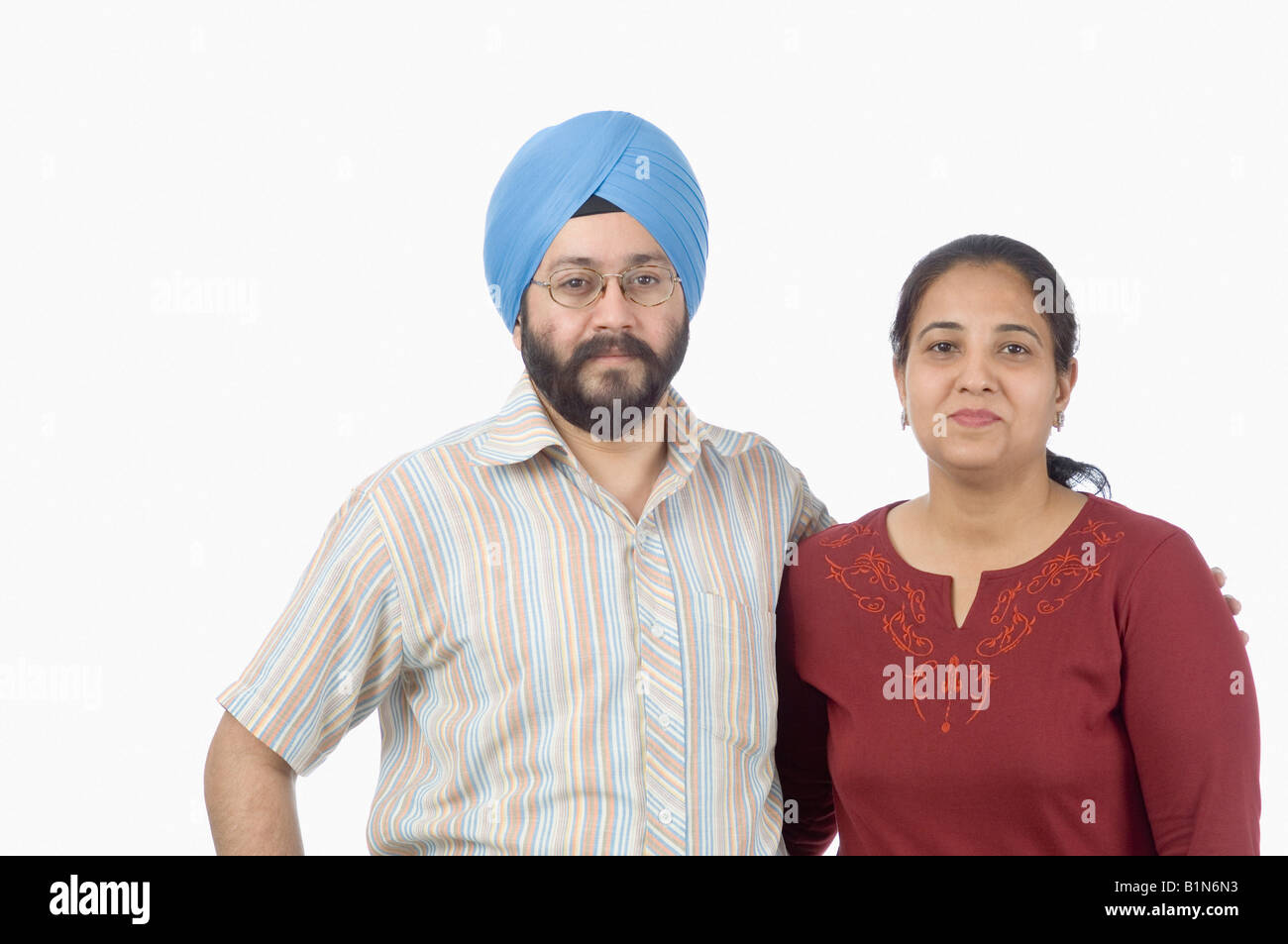 Portrait of a mid adult couple Stock Photo - Alamy