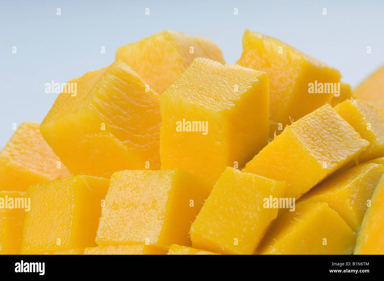 Close-up of mango slices cut into segments Stock Photo - Alamy