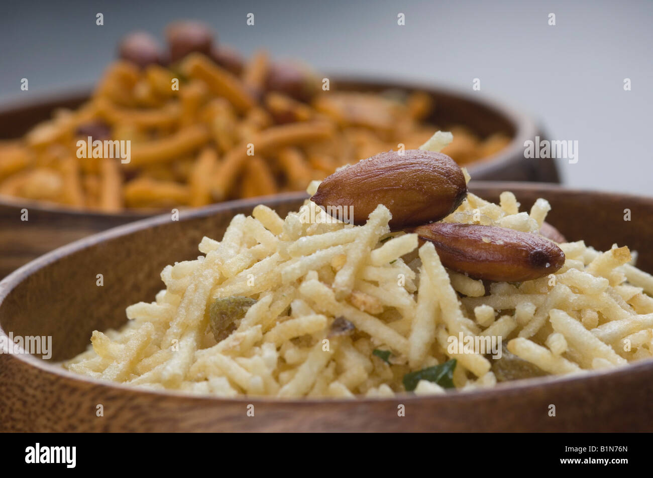 Close-up of two bowls of snacks Stock Photo - Alamy