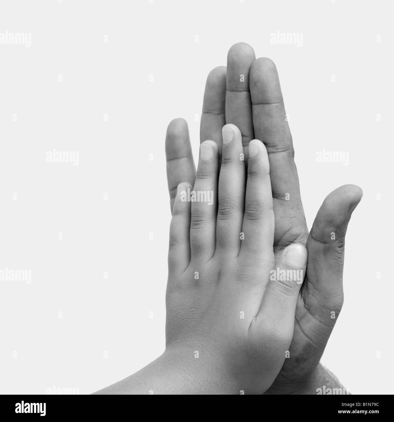 Boys high five Black and White Stock Photos & Images - Alamy