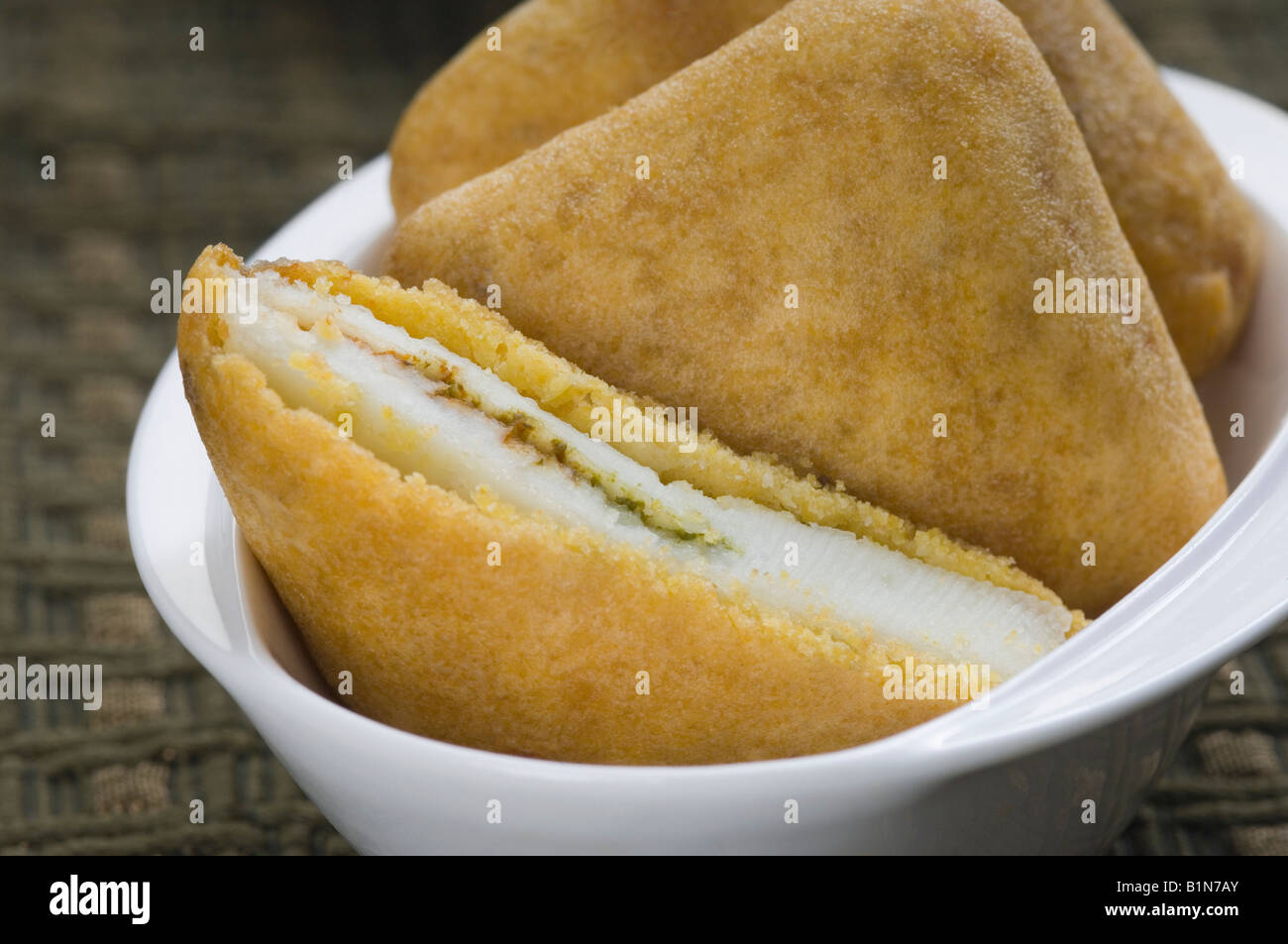 Close-up of three bread pakoras in a bowl Stock Photo - Alamy