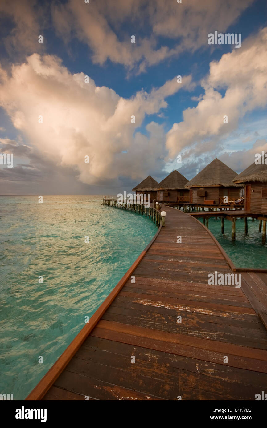 pathway to over water bungalows on tropical island Stock Photo - Alamy