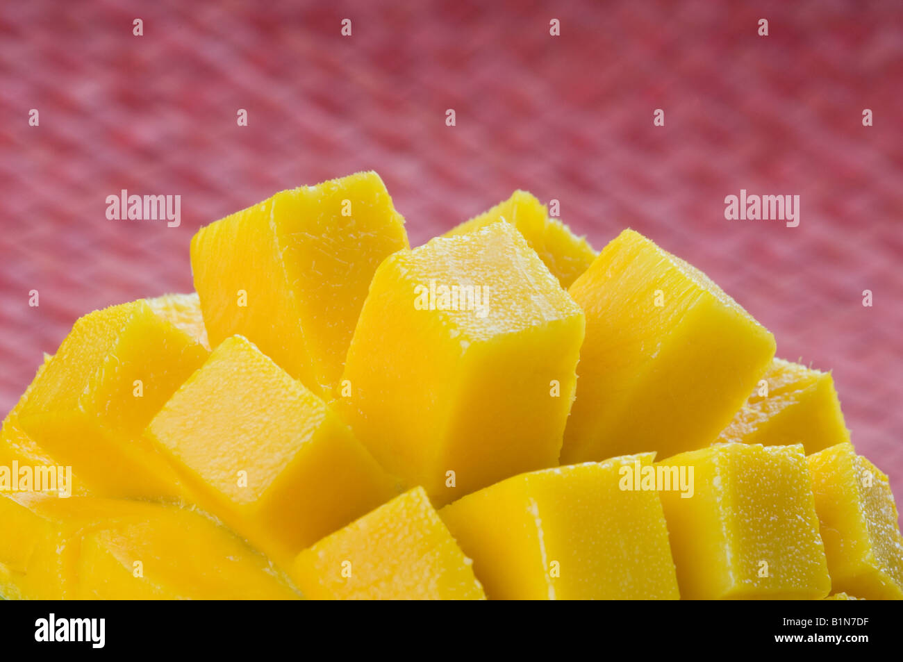 Close-up of mango slices cut into segments Stock Photo - Alamy