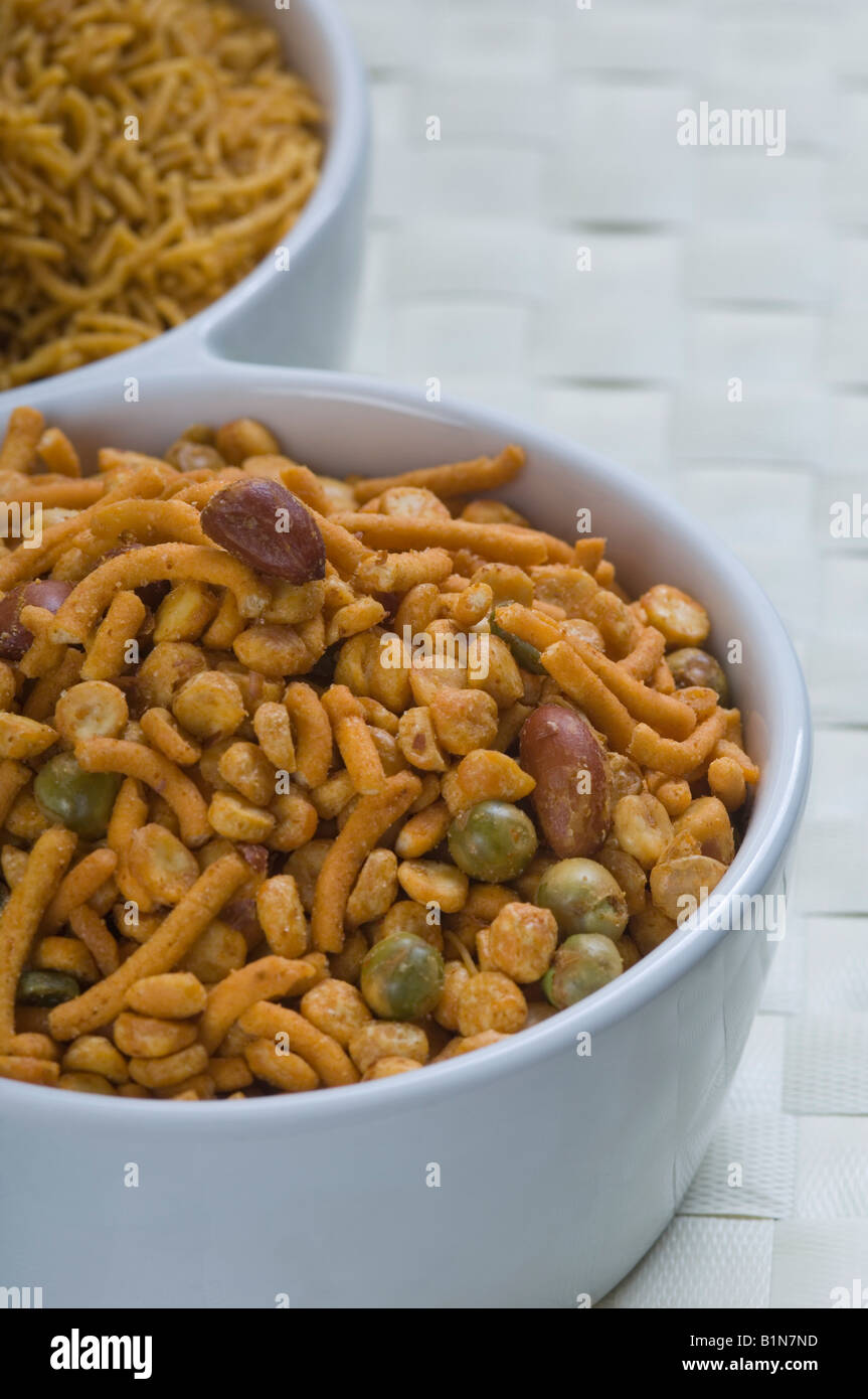 Close-up of two bowls of snacks Stock Photo - Alamy