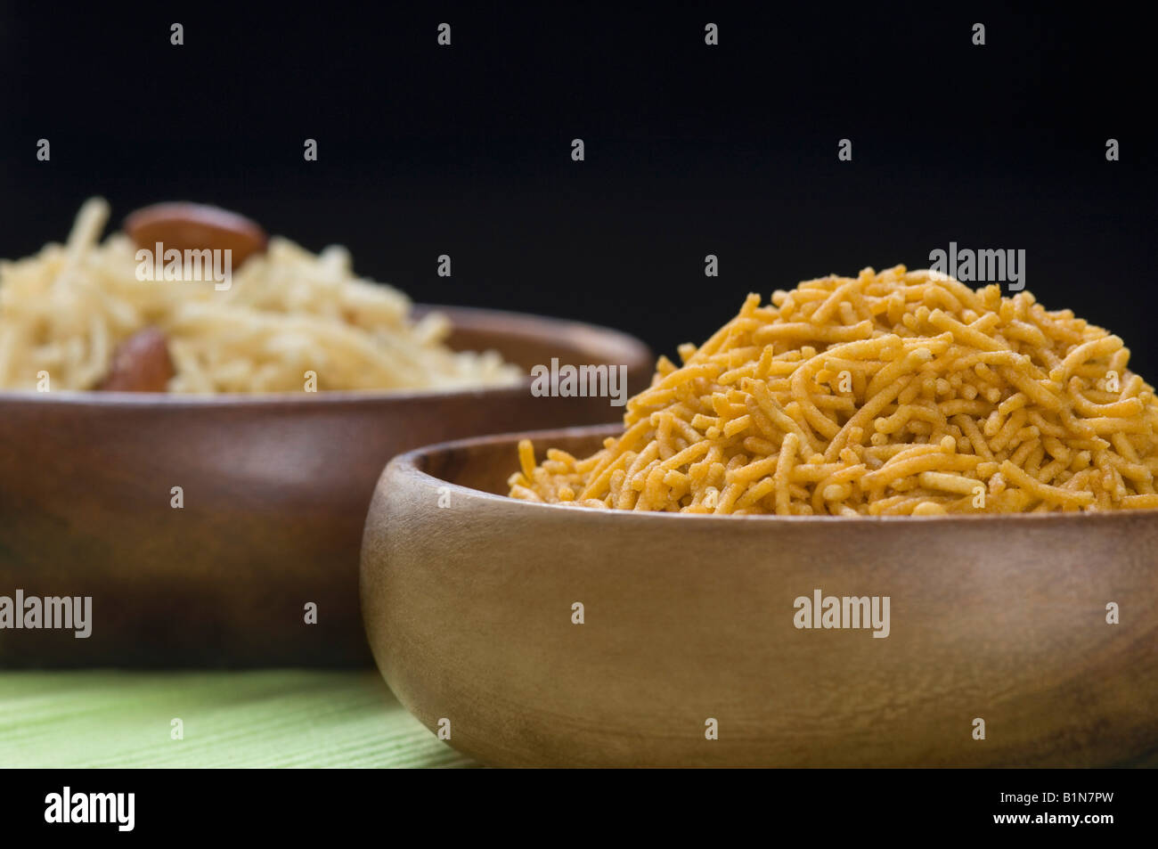 Close-up of two bowls of snacks Stock Photo - Alamy