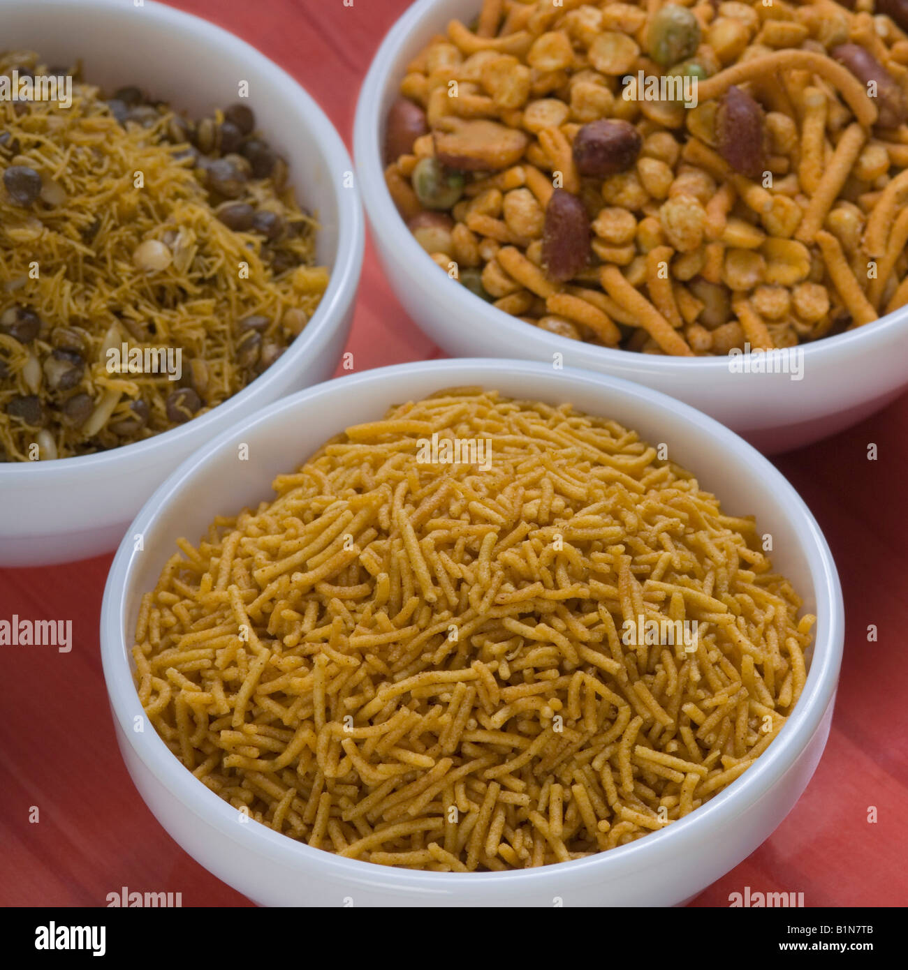 Close-up of various type of snacks in bowls Stock Photo - Alamy